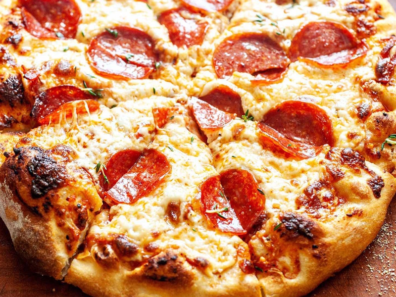 Order Bell's Pizza (5 Ave) - J-933 5 Ave SW, Calgary